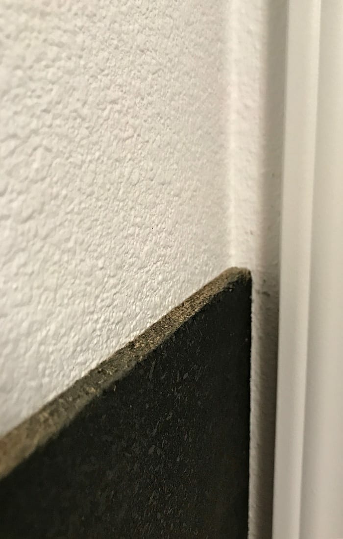 How to Create a Dramatic Wood Shims Wall in Your Home