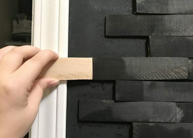 How to Create a Dramatic Wood Shims Wall in Your Home