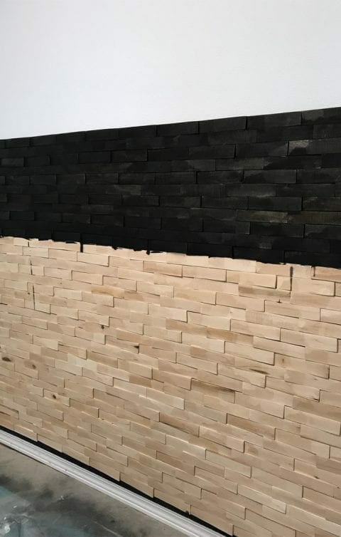 How to Create a Dramatic Wood Shims Wall in Your Home
